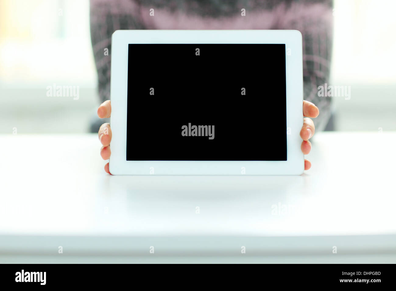Closeup image of male hands showing display of tablet computer Stock ...