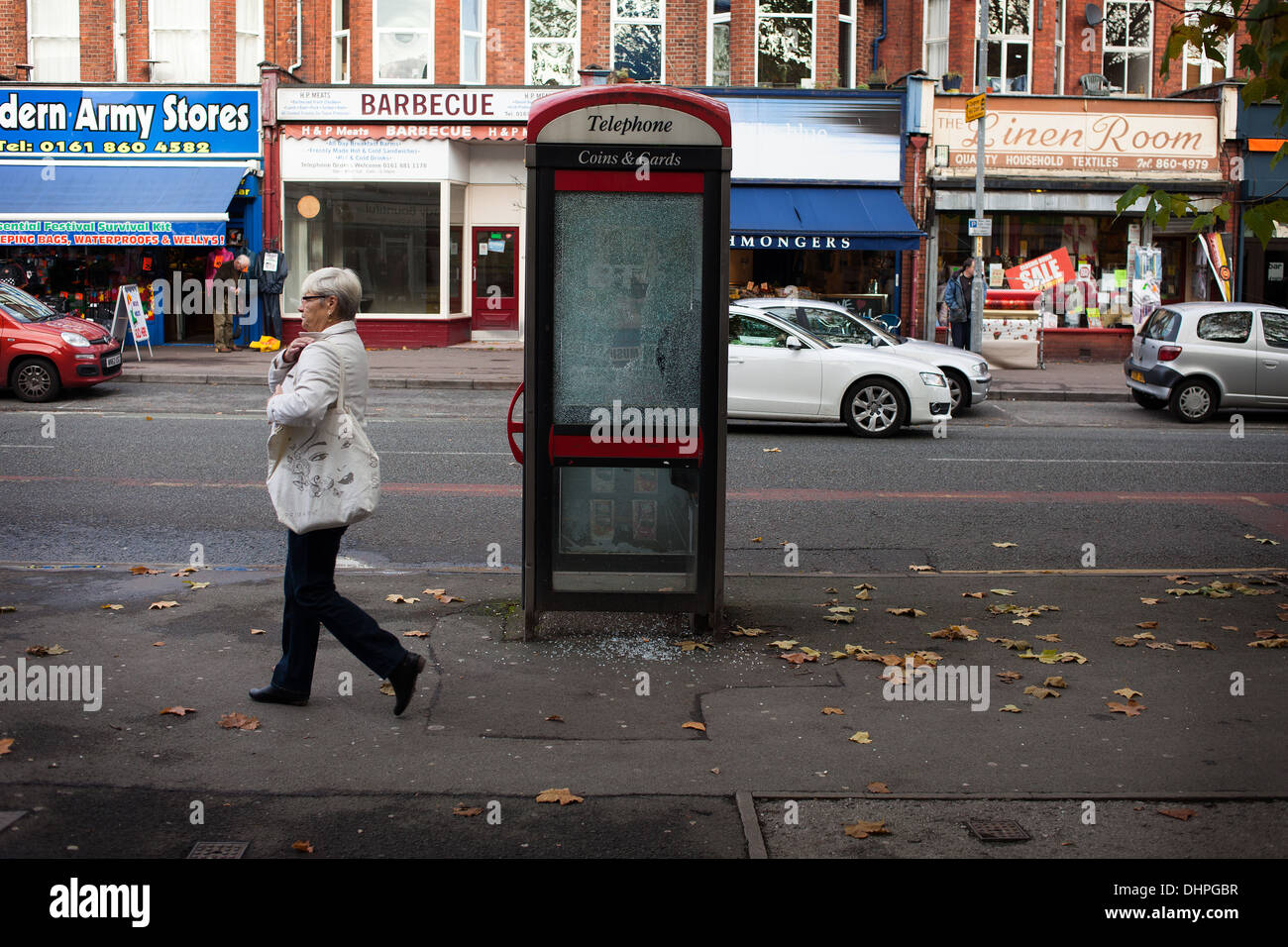 A BT telephone box in Chorlton , Manchester , with a smashed window ...