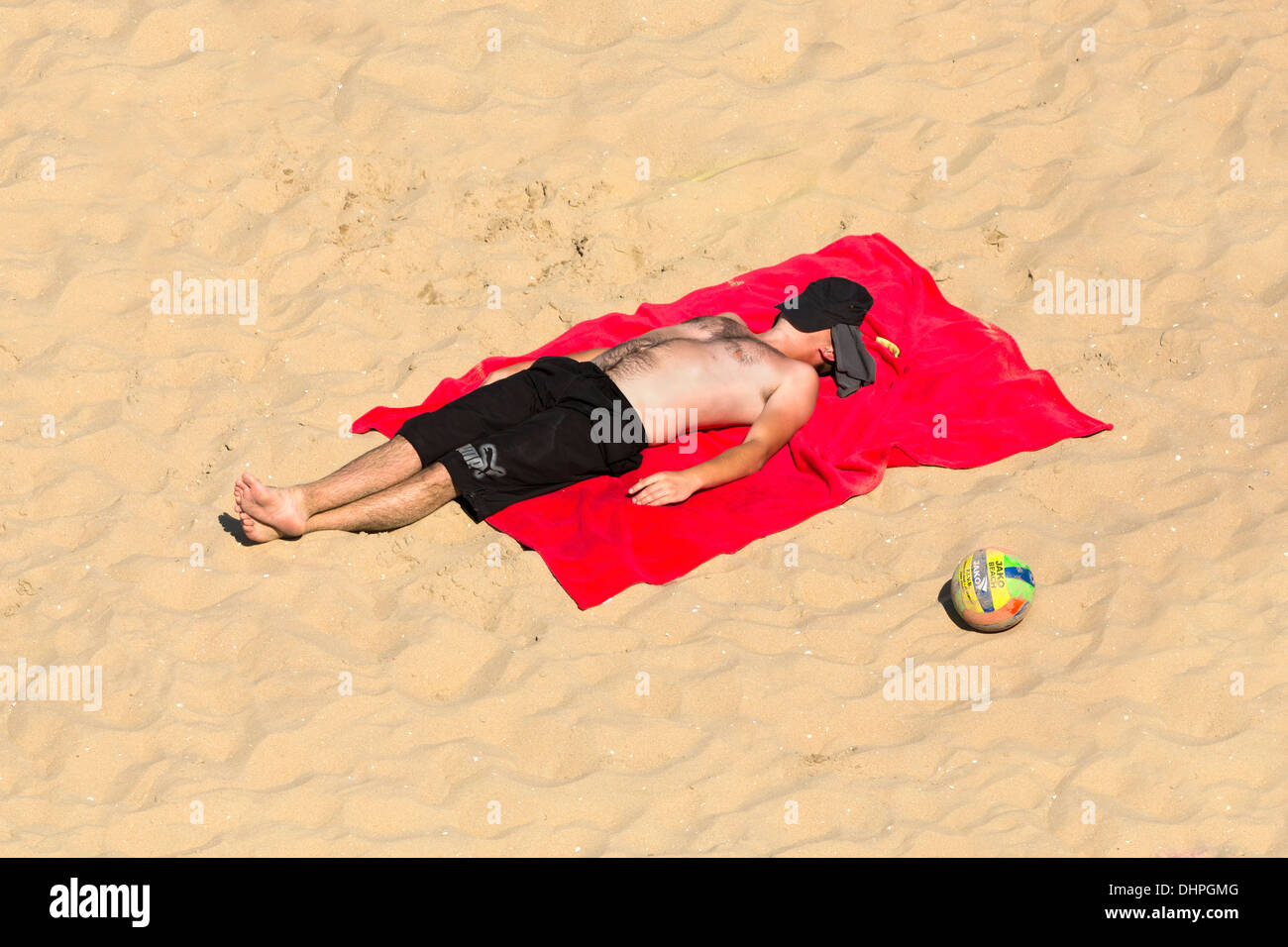 Netherlands, Scheveningen, near The Hague. Summertime on the beach. Man ...