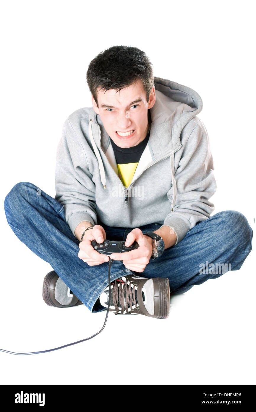 Furious guy with a joystick for game console. Isolated Stock Photo - Alamy