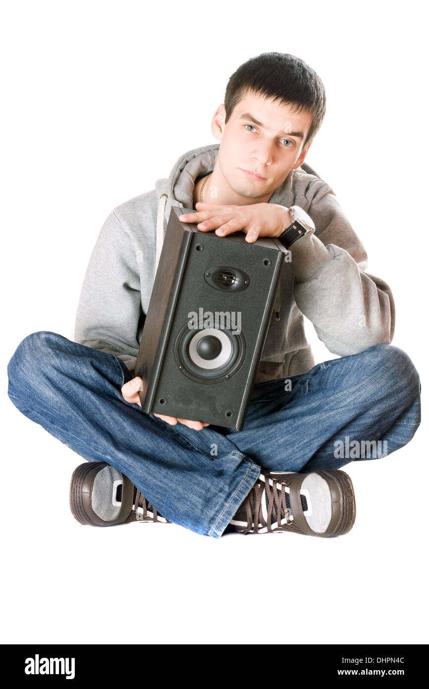 Young man with a speaker in his hands. Isolated Stock Photo - Alamy