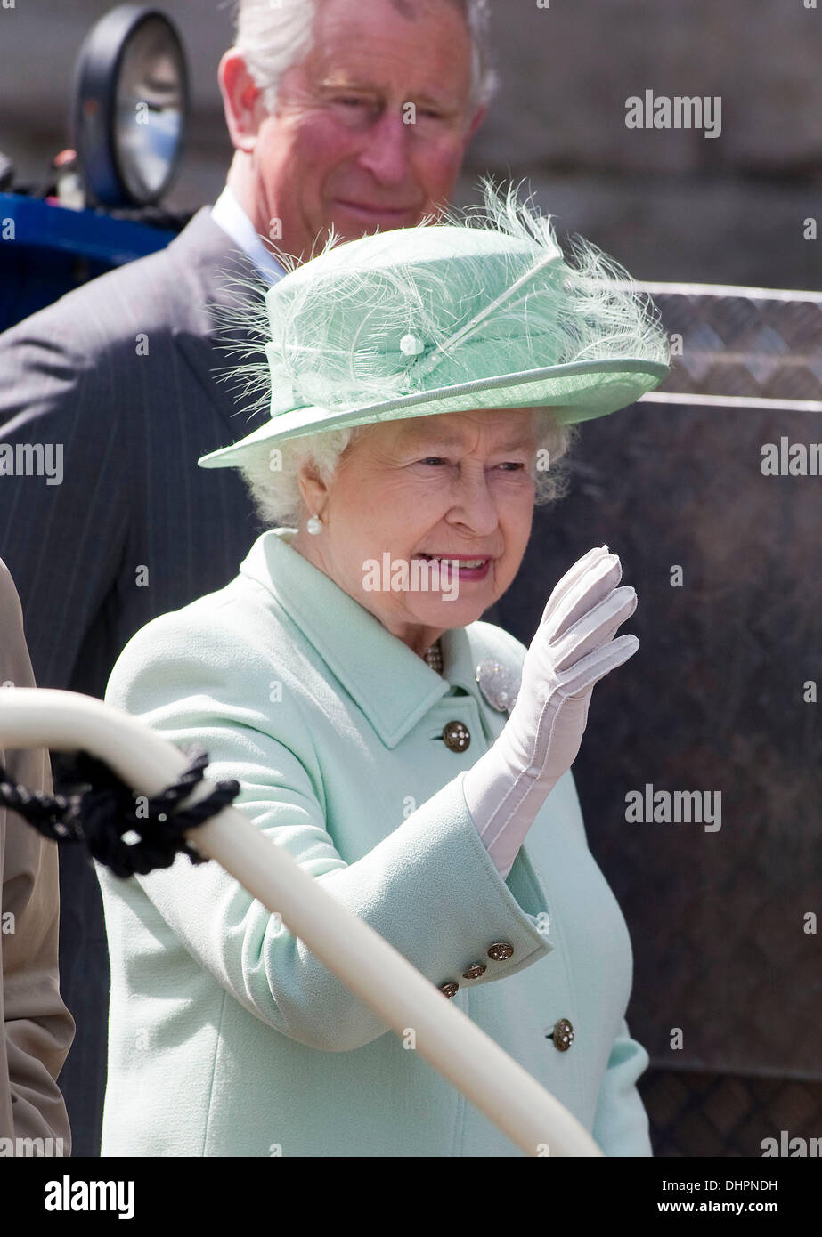 Queen Elizabeth II and Prince Charles, Prince of Wales travel by barge ...