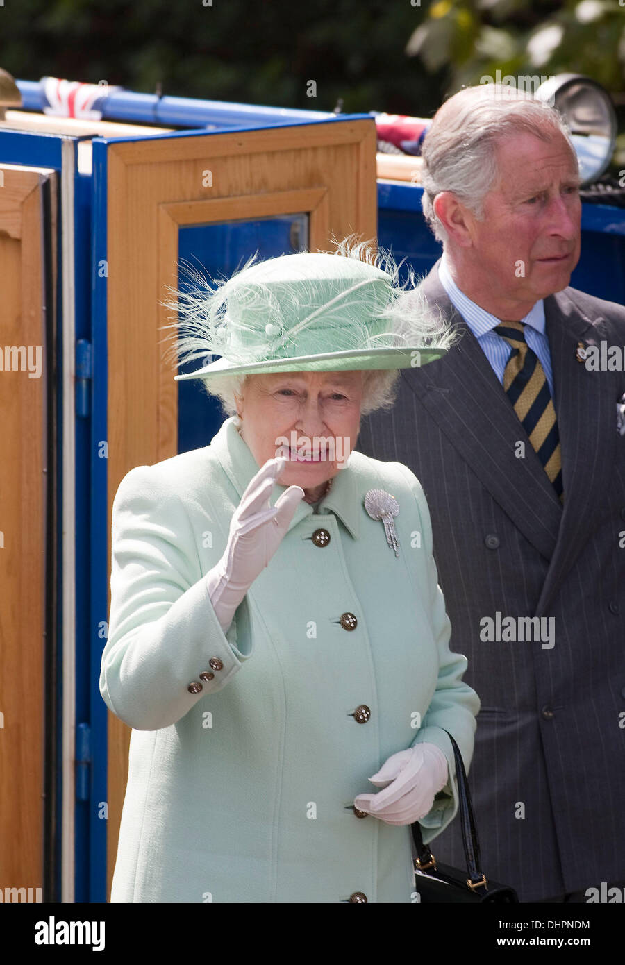 Queen Elizabeth II and Prince Charles, Prince of Wales travel by barge ...