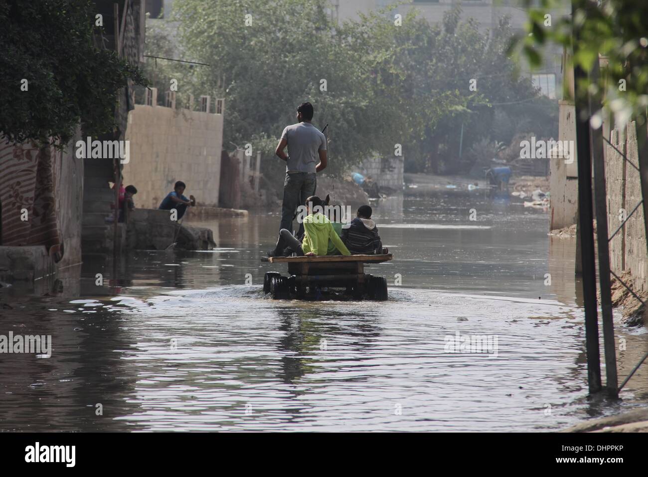 Gaza, Palestinian Territories, . 14th Nov, 2013. A Palestinian rides ...