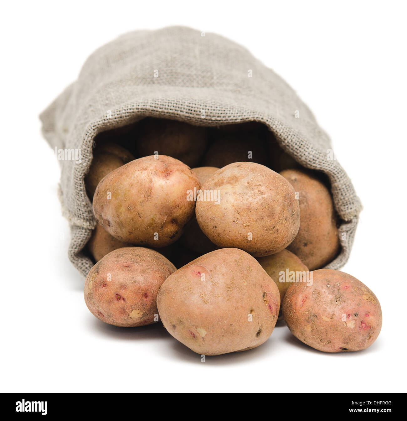 potatoes and burlap sack isolated on white background Stock Photo - Alamy