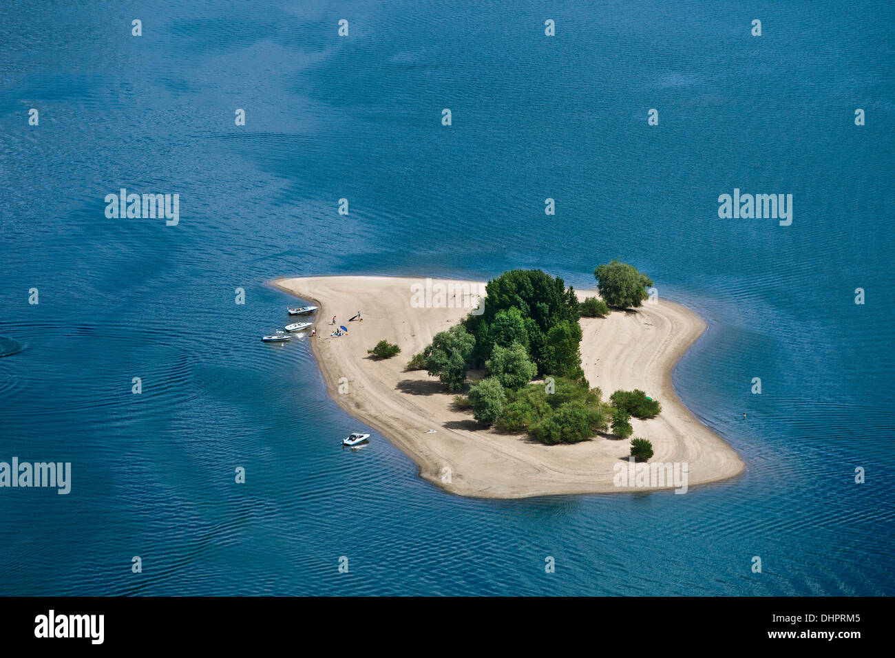 Netherlands, Tolkamer near Lobith, People relaxing on little island in ...