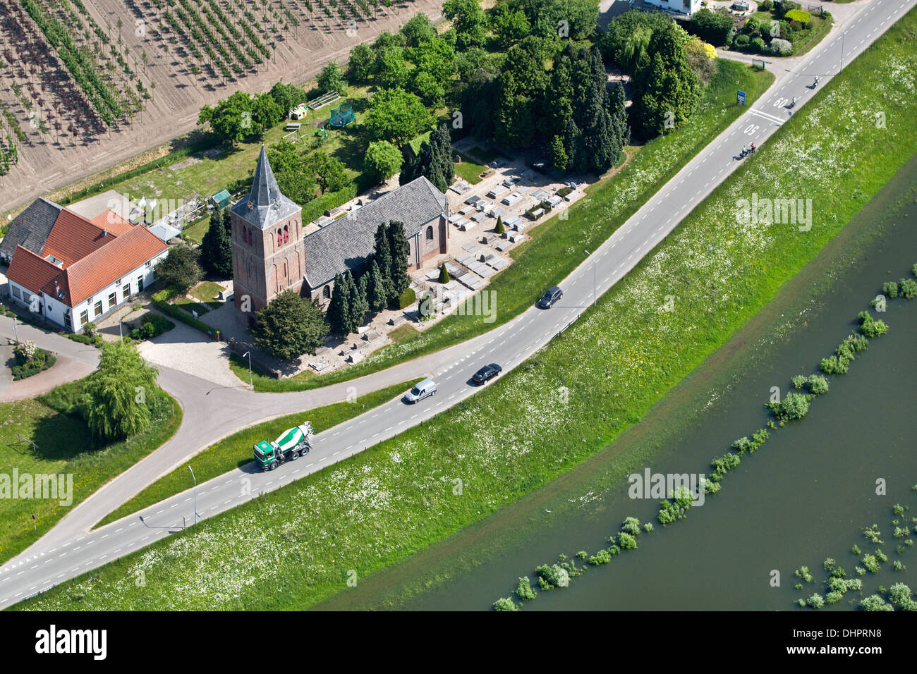 Netherlands, Dodewaard. Waal river. Church on dyke. Aerial Stock Photo ...