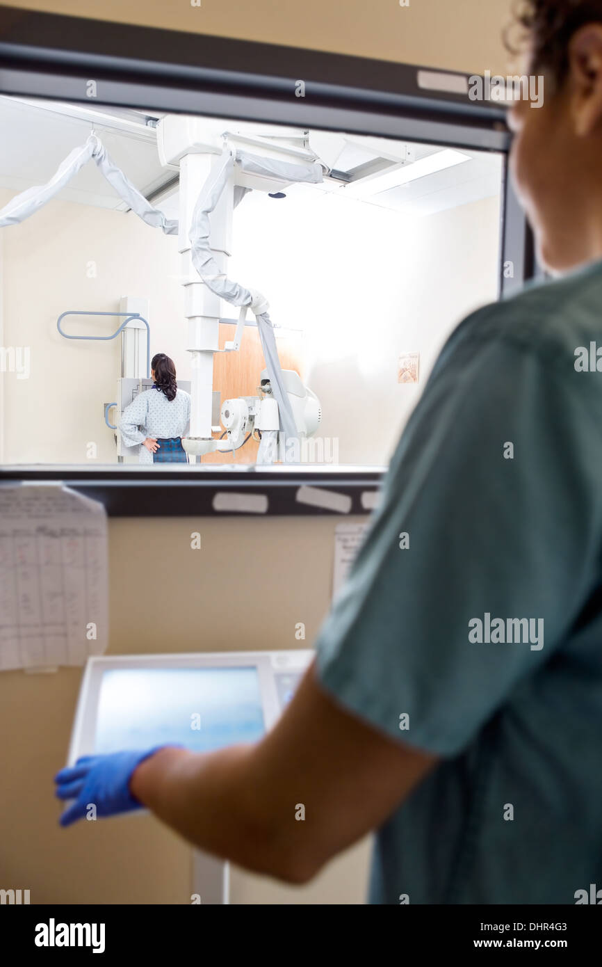 Woman operating lab machine hi-res stock photography and images - Alamy