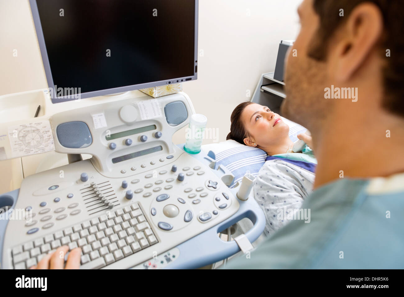 Nurse Performing Ultrasound Procedure Stock Photo - Alamy