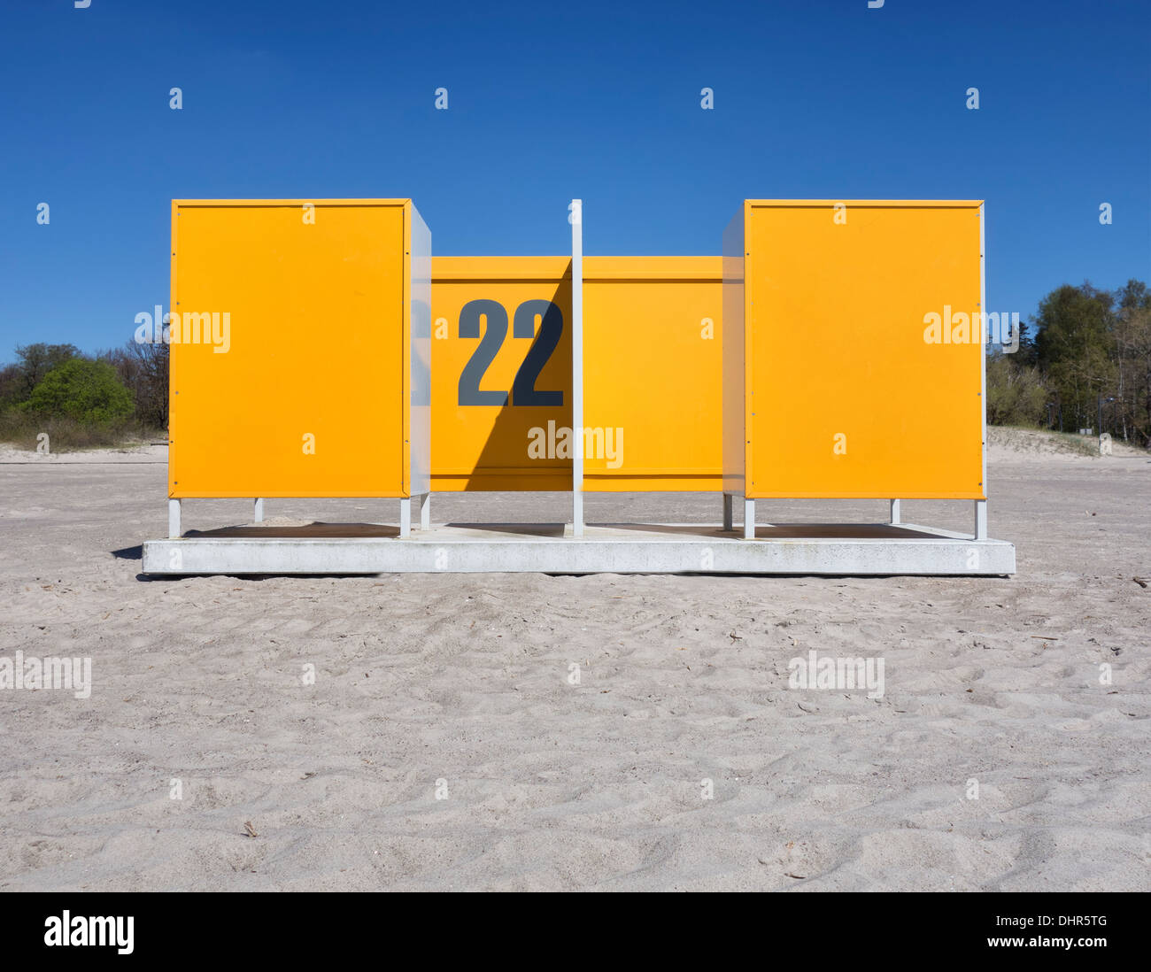 Yellow dressing cabin, changing cubicle number 22 on empty Pärnu beach ...