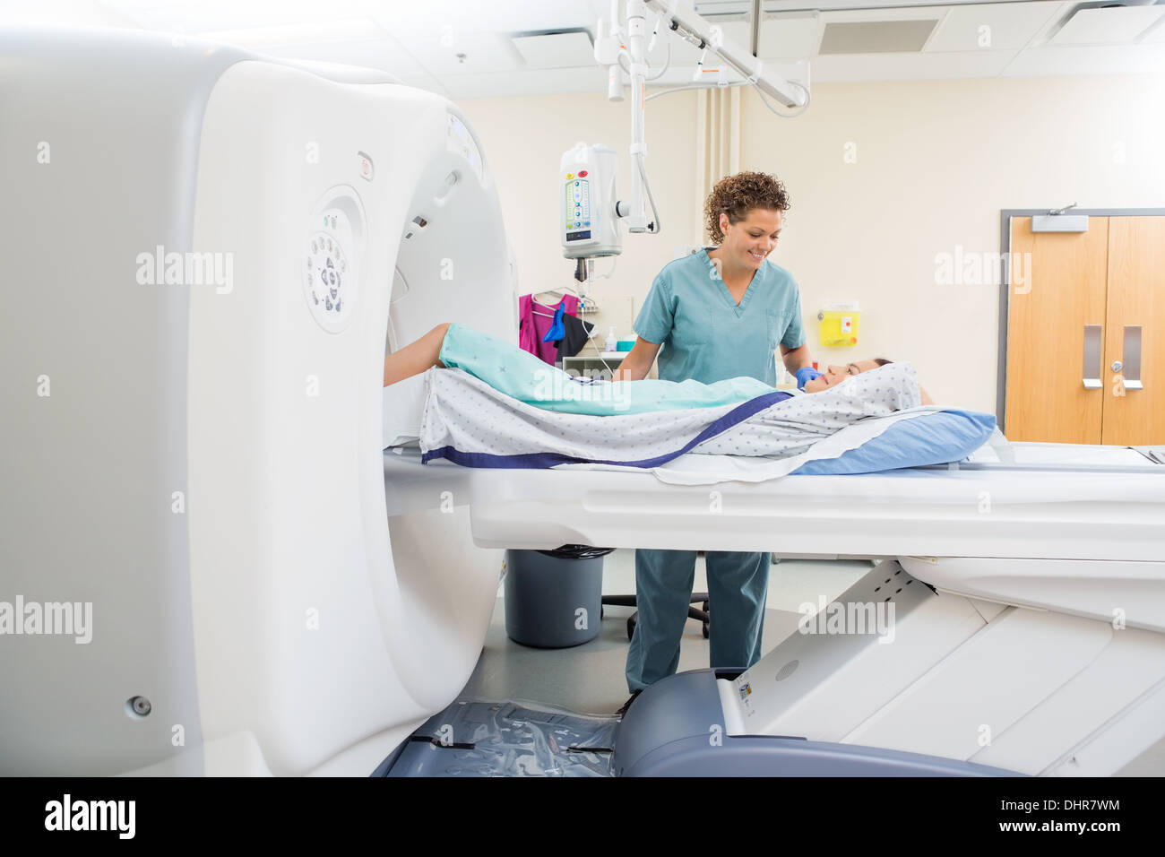 Nurse Looking At Patient Undergoing CT Scan Test Stock Photo - Alamy