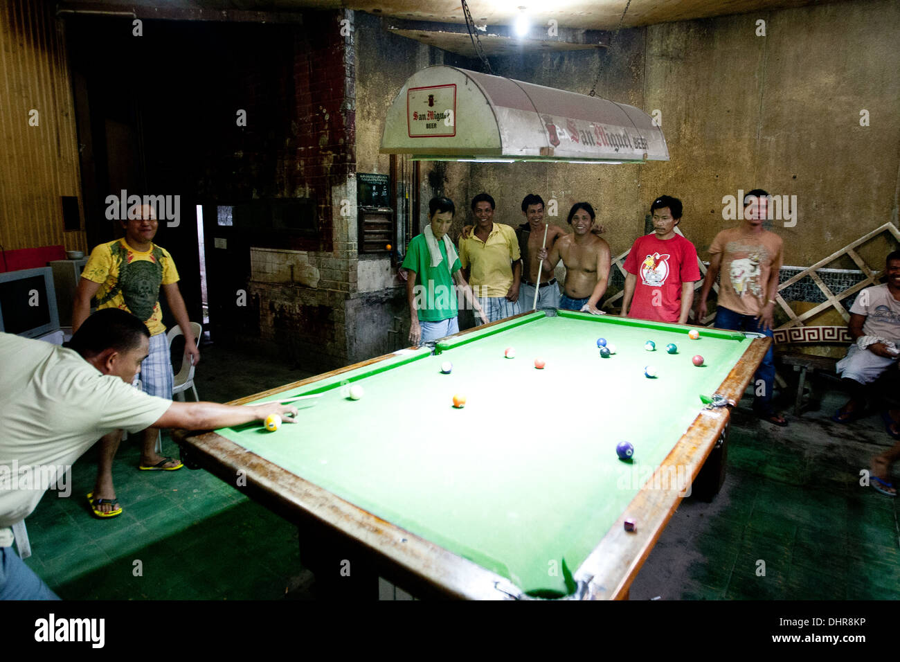 Men play in a pool hall in downtown Davao Stock Photo - Alamy
