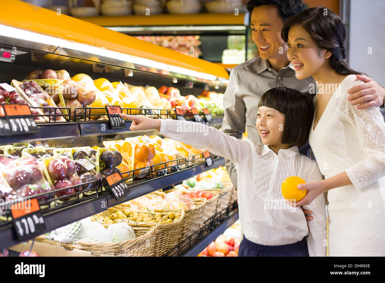 Family shopping in supermarket Stock Photo - Alamy
