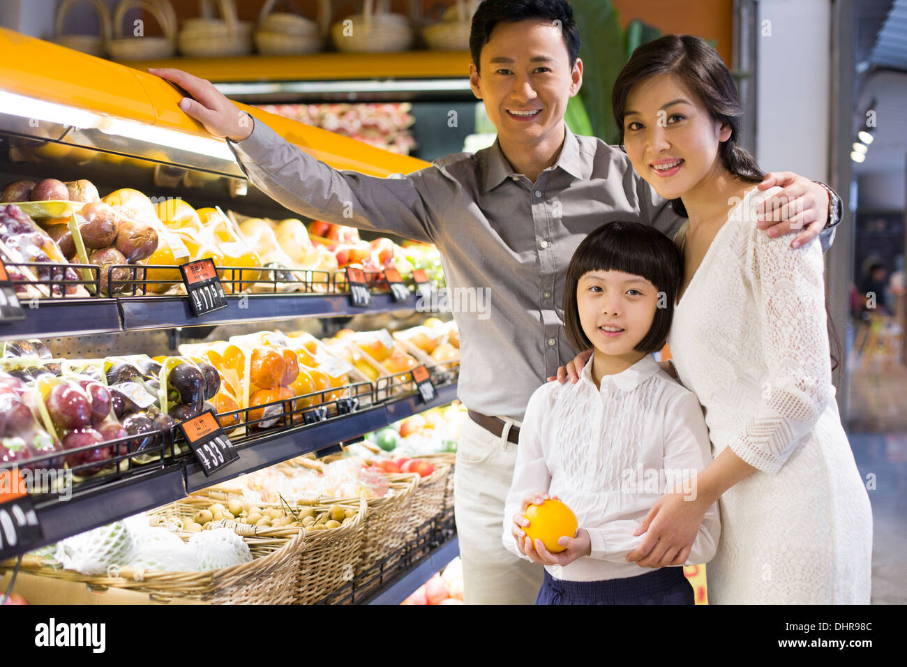Family shopping in supermarket Stock Photo - Alamy