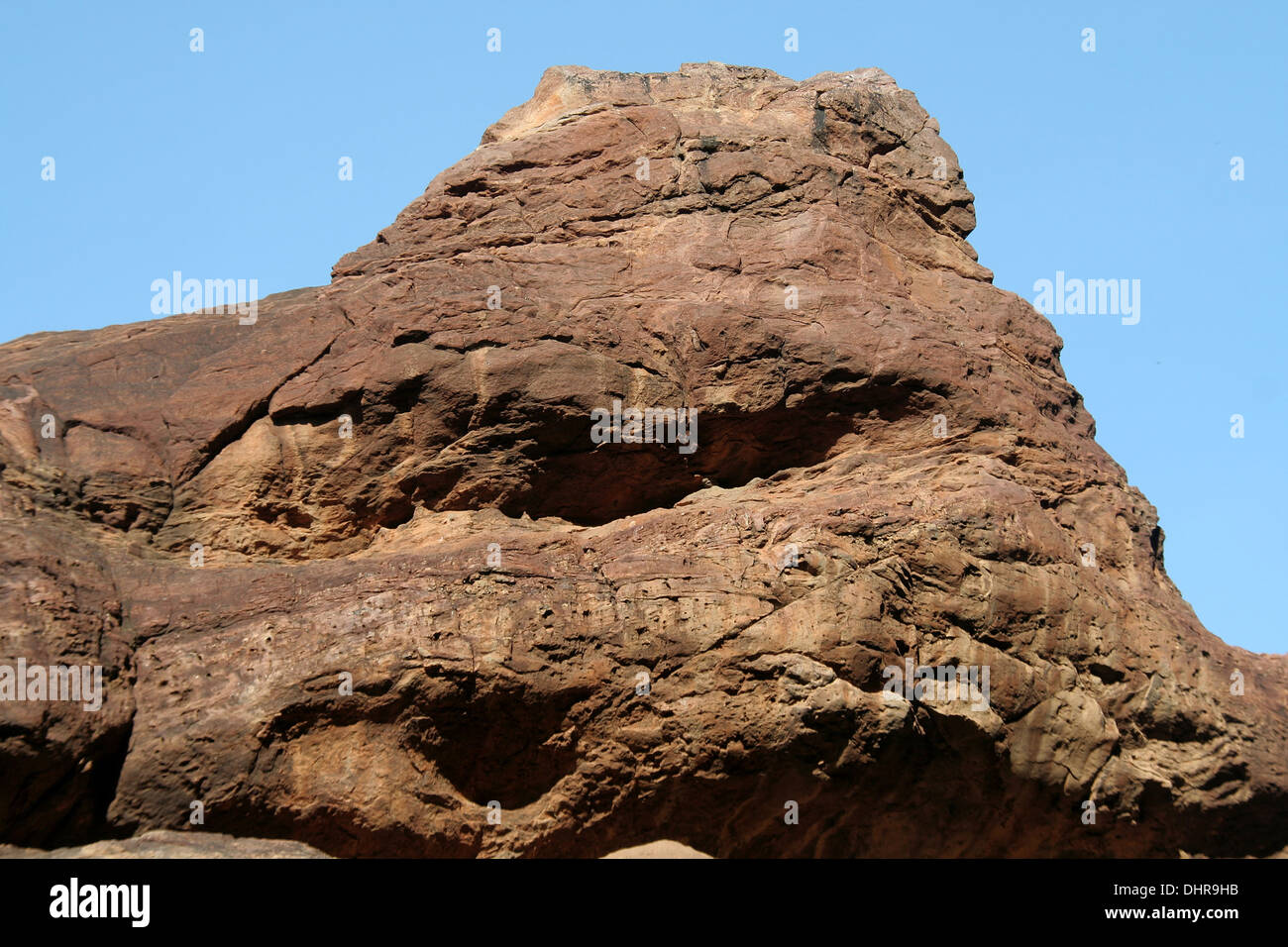 Gigantic rock lit by morning sunlight at northern hill Badami ...