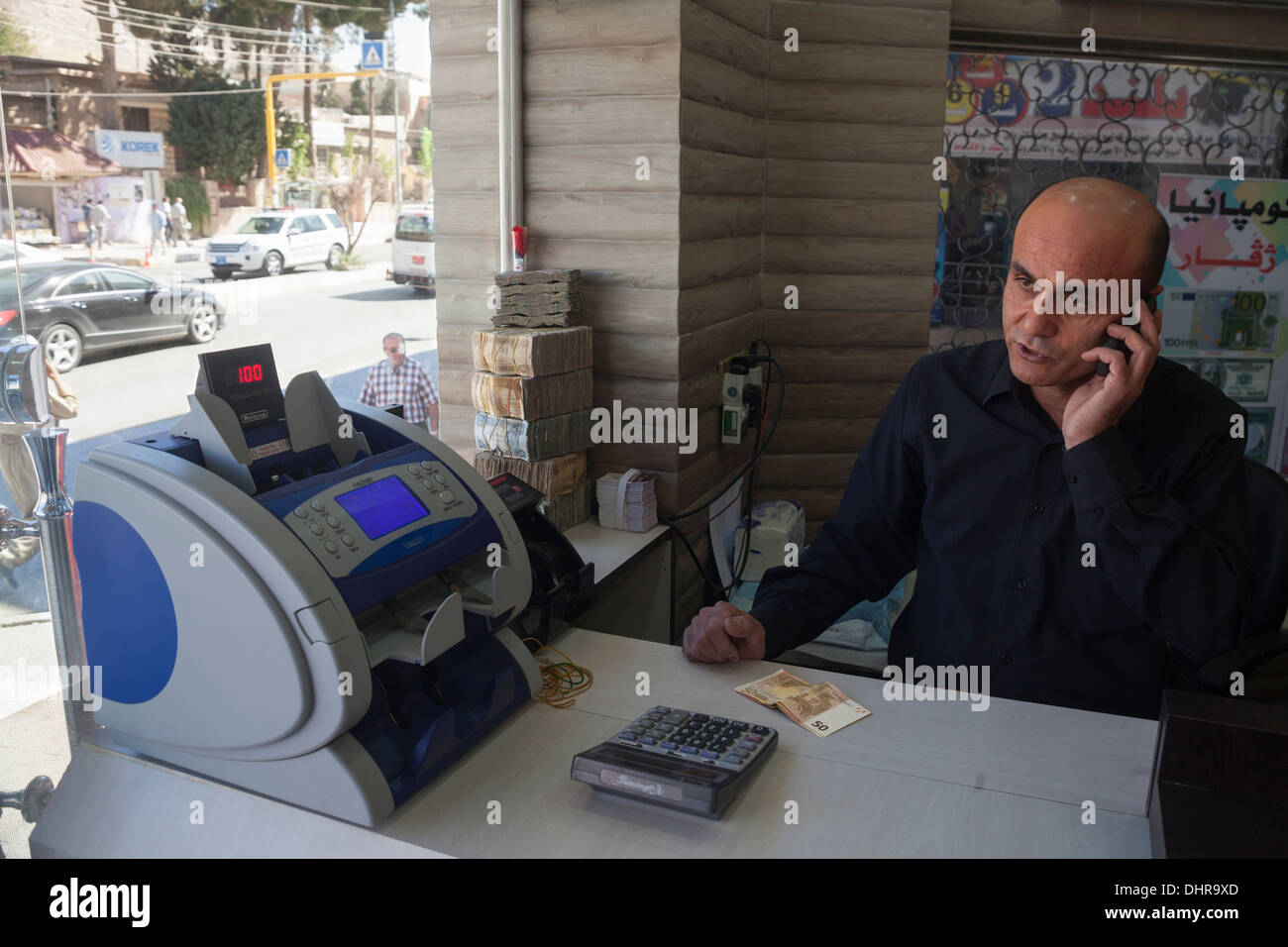 Interior of a money exchange shop with the cashier Stock Photo - Alamy
