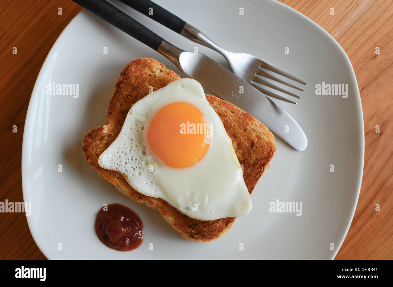 Egg on toast, with ketchup Stock Photo - Alamy