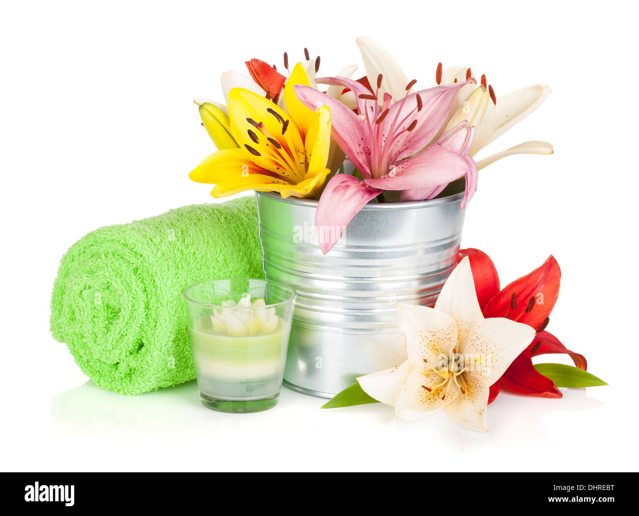 Spa setting with colorful lily flowers. Isolated on white background ...