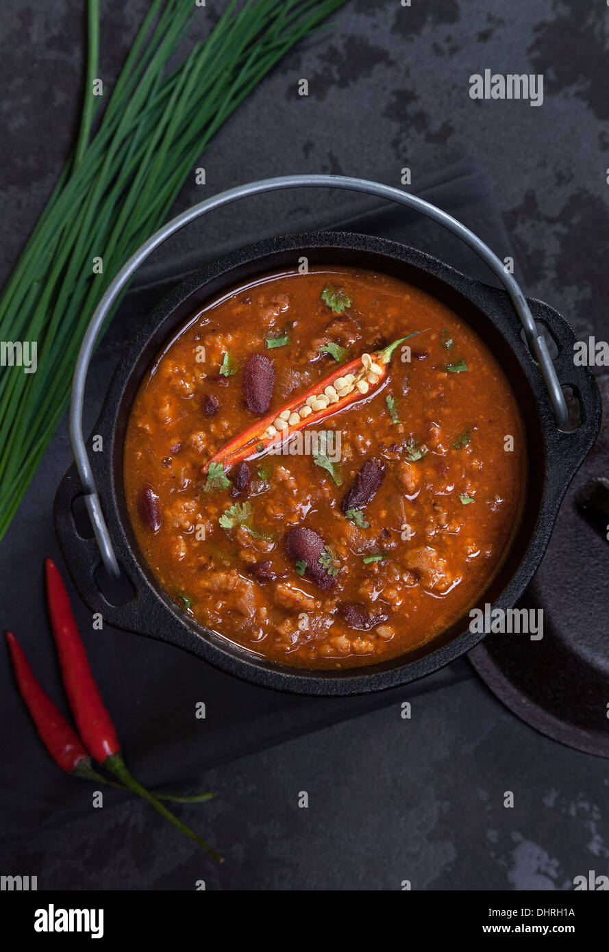 Spicy Mexican soup with beans and peppers Stock Photo - Alamy