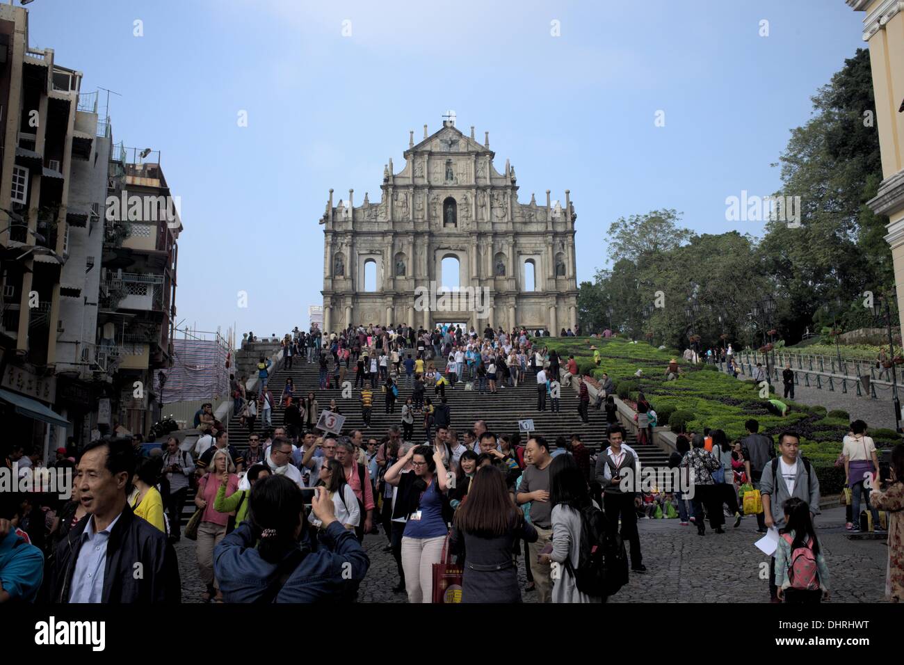 Tourists crowd the Ruins of St. Paul on a clear day in Macau, China ...
