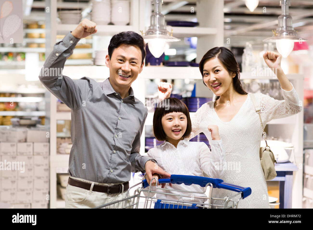 Happy family celebrating Stock Photo - Alamy