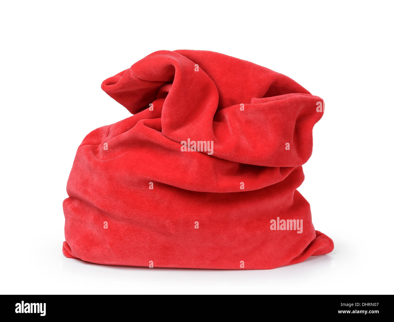 red santas bag from velvet fabric, isolated on white Stock Photo - Alamy
