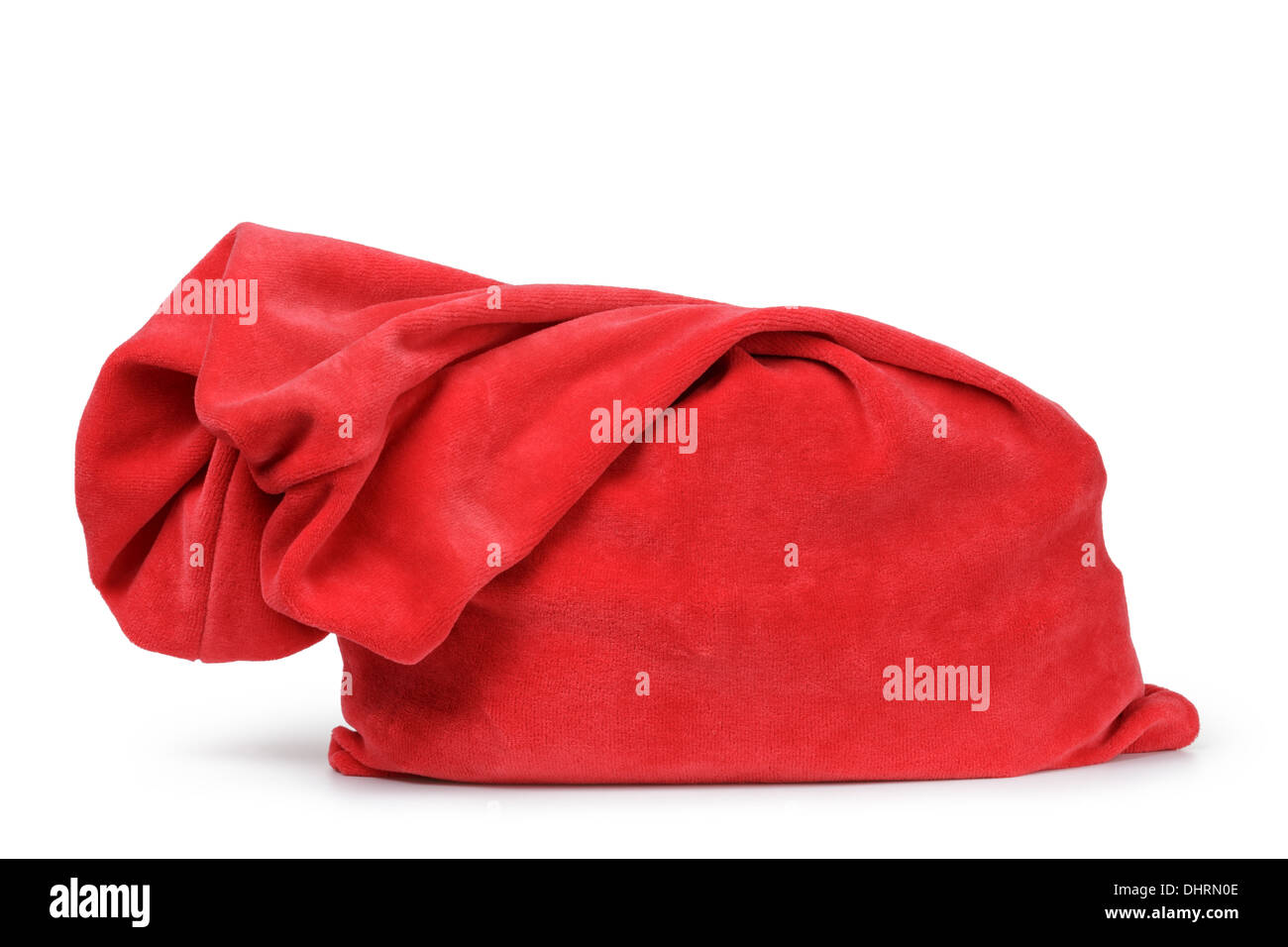 red santas bag from velvet fabric, isolated on white Stock Photo - Alamy