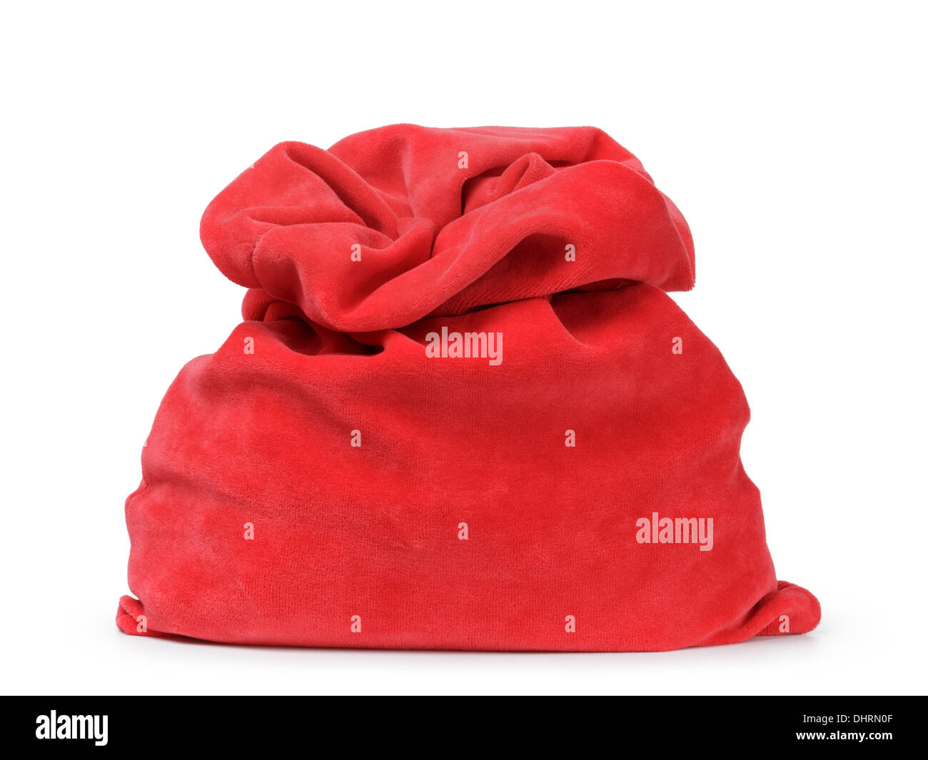 red santas bag from velvet fabric, isolated on white Stock Photo - Alamy