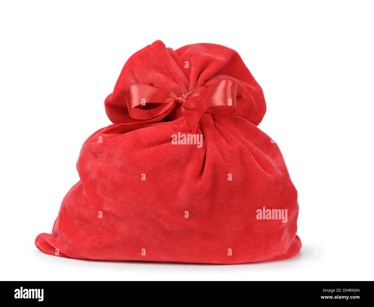 red santas bag from velvet fabric, isolated on white Stock Photo - Alamy
