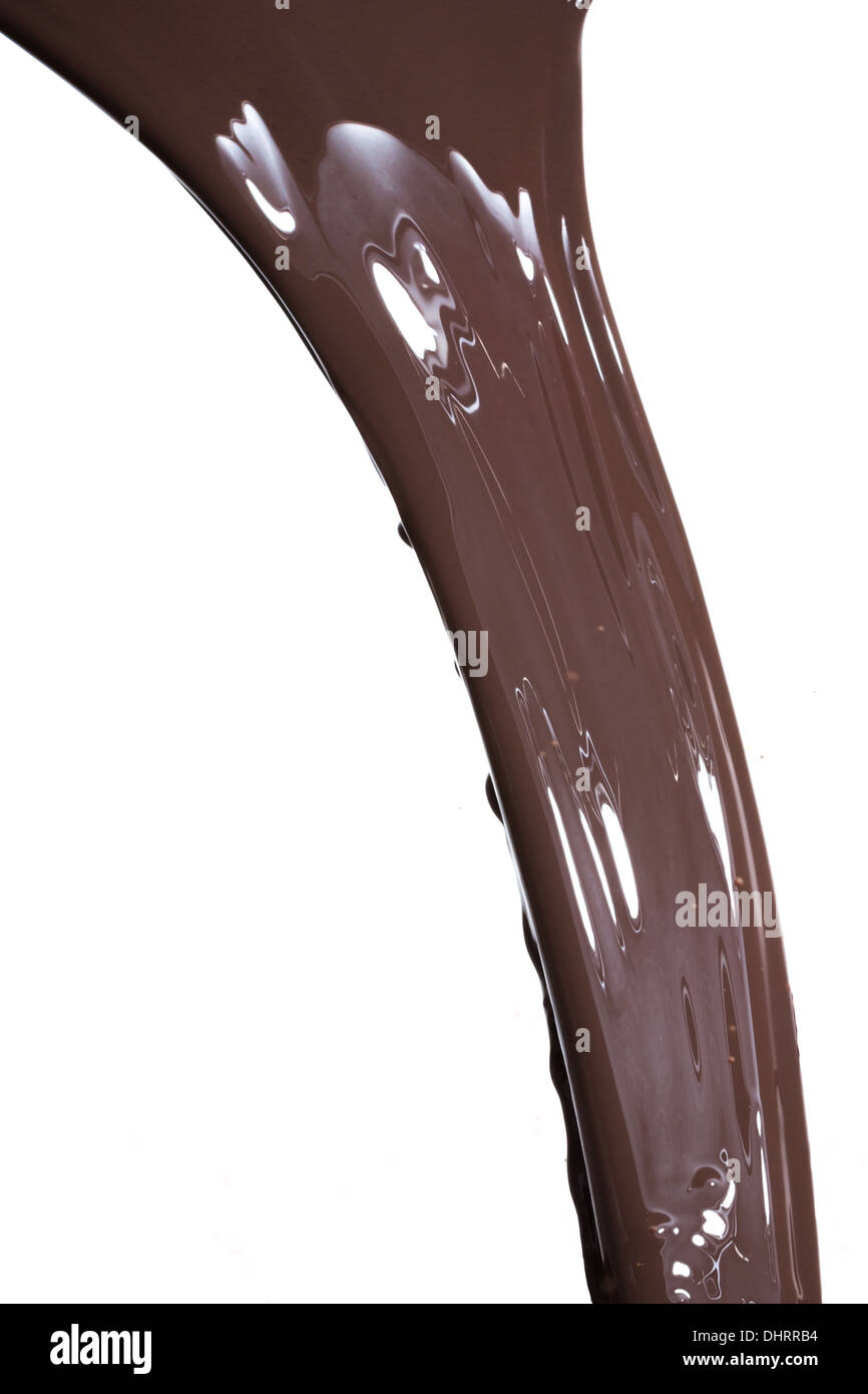 pouring chocolate syrup, isolated on white background Stock Photo - Alamy