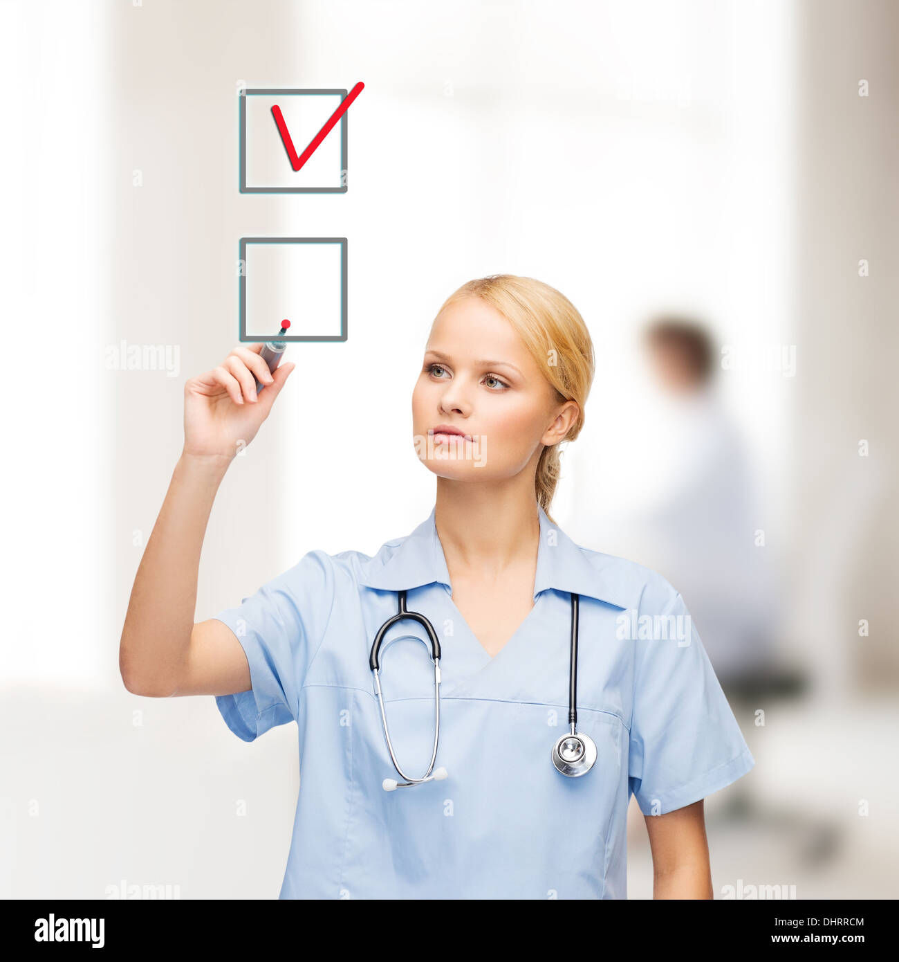 doctor or nurse with marker drawning red checkmark Stock Photo - Alamy