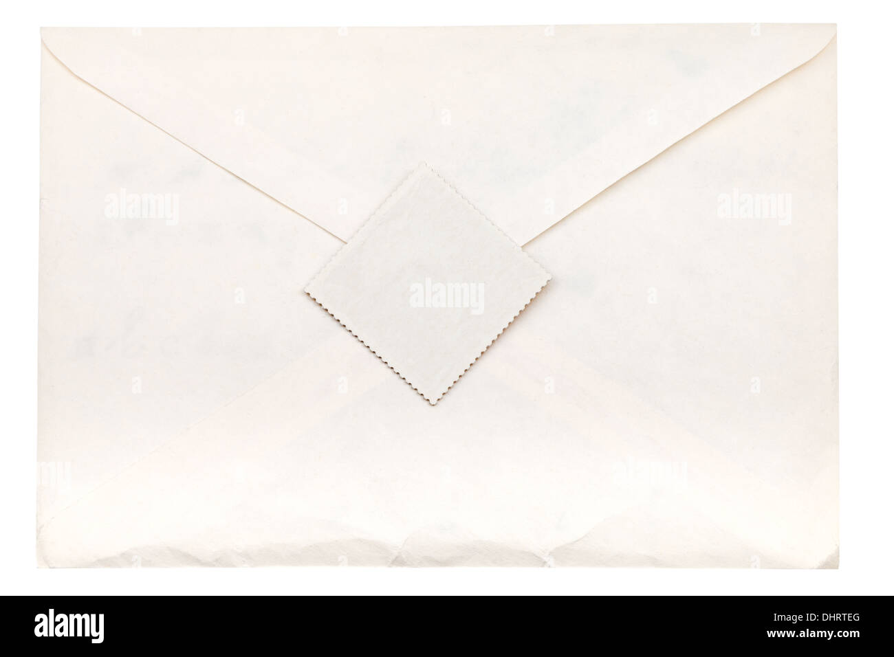 closed paper envelope sealed by postage stamp isolated on white ...