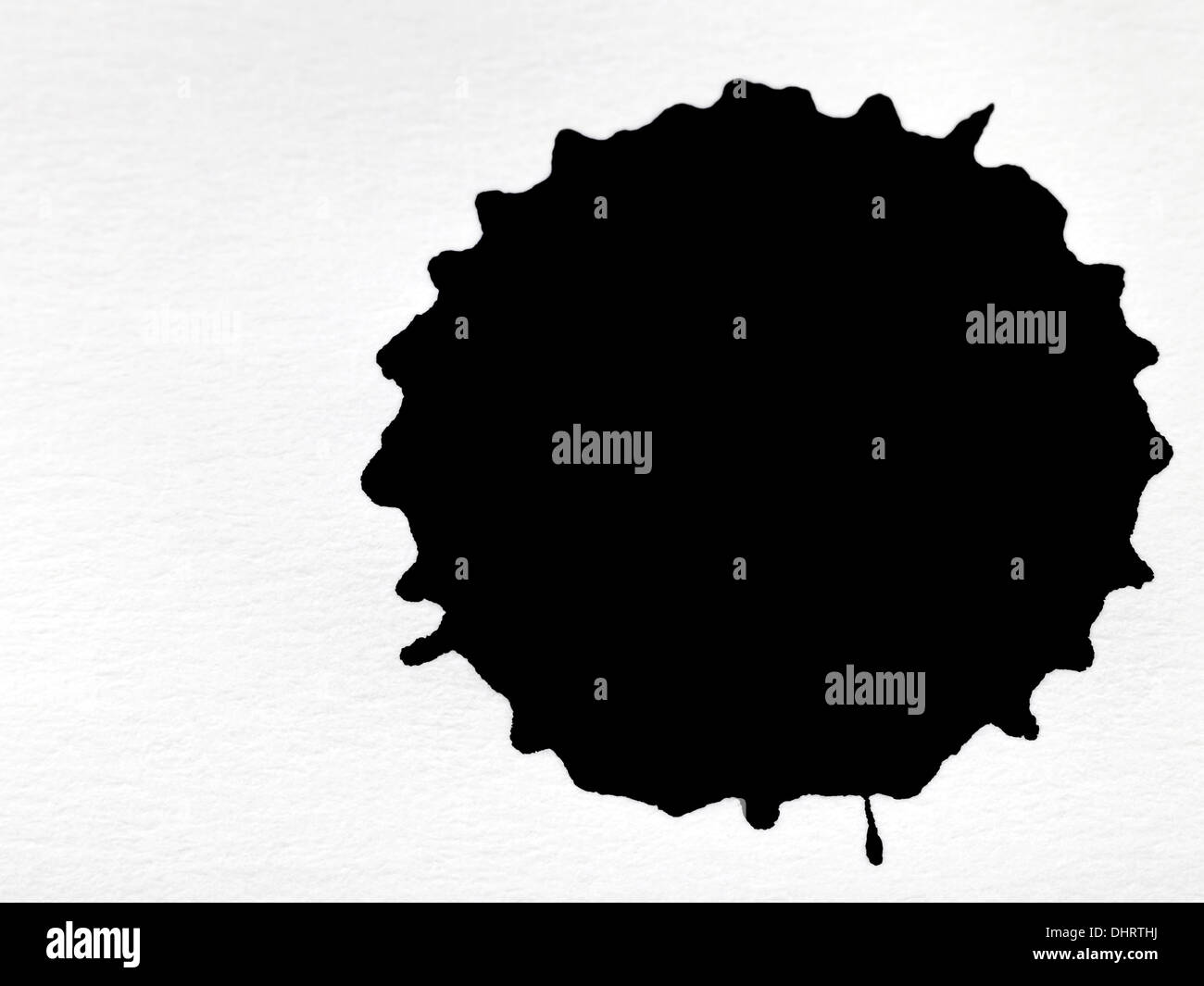 black ink blot on white paper sheet Stock Photo - Alamy
