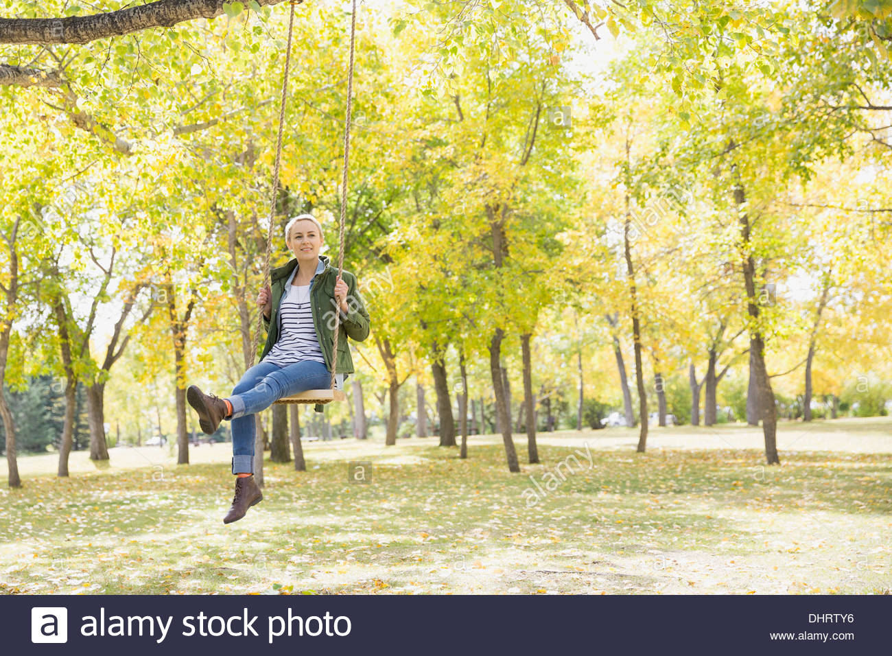 Swing sitting hi-res stock photography and images - Alamy