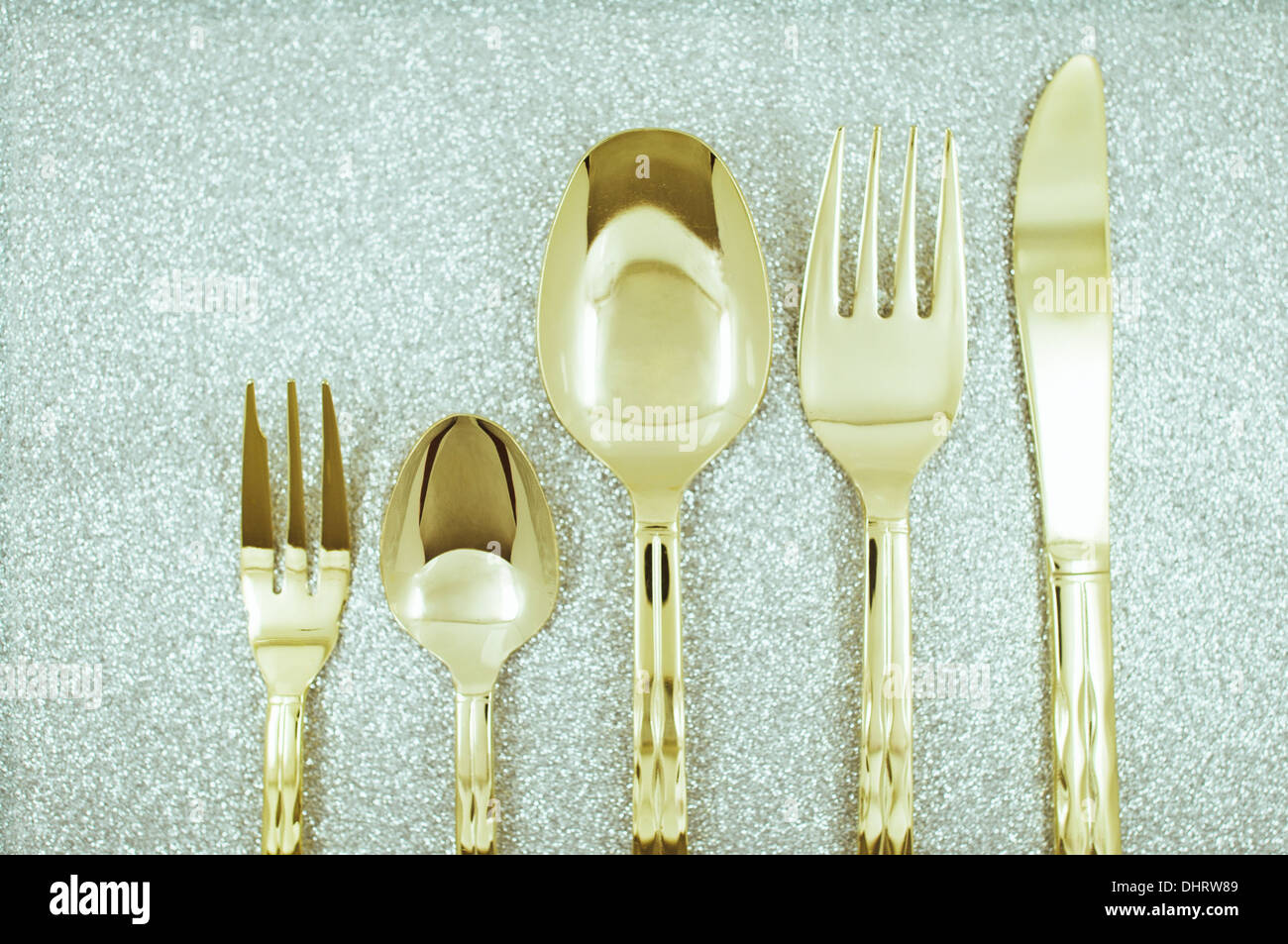 Cutlery golden spoon hi-res stock photography and images - Alamy