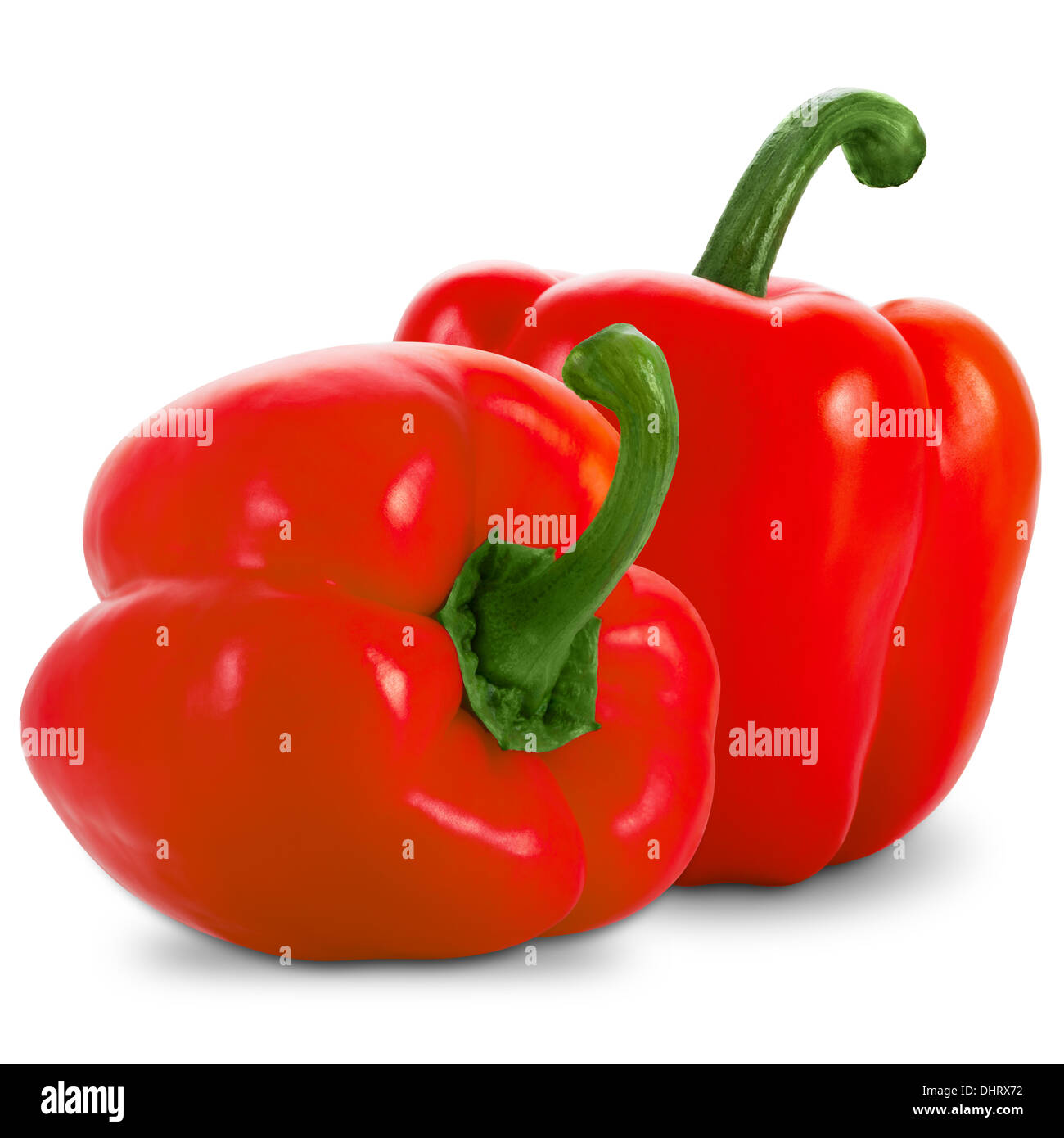 Two red peppers isolated on white background Stock Photo - Alamy