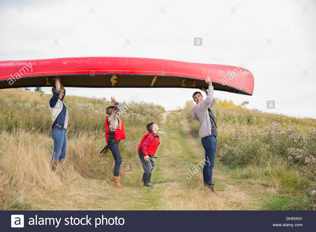 Family carrying a canoe hi-res stock photography and images - Alamy