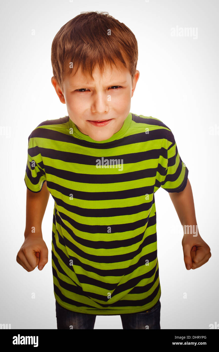 angry child boy blond bully bad aggressive fights in striped green ...