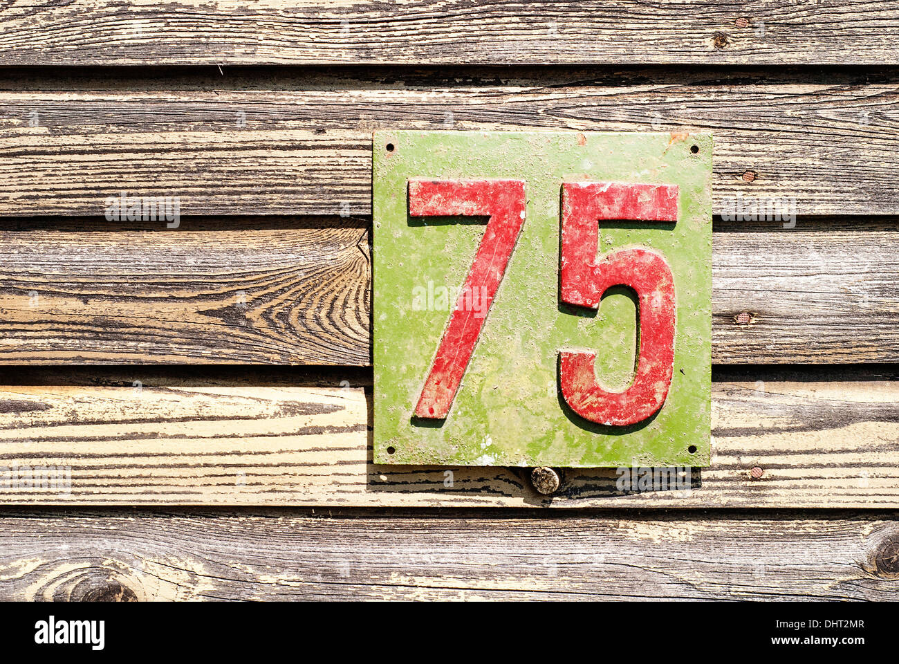 House number 75 sign on wall hi-res stock photography and images - Alamy