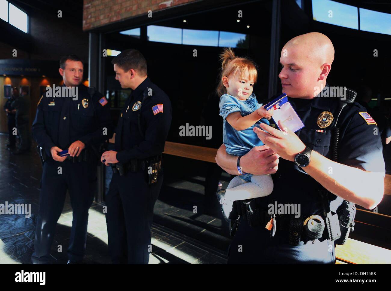 Nov. 14, 2013 - U.S. - November 14, 2013 - Officer Josh Schultz watches ...