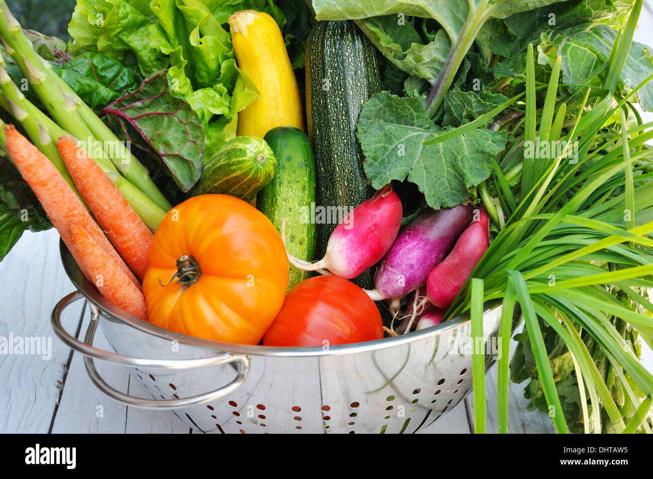 Fresh vegetables just collected from a garden, in colander Stock Photo ...