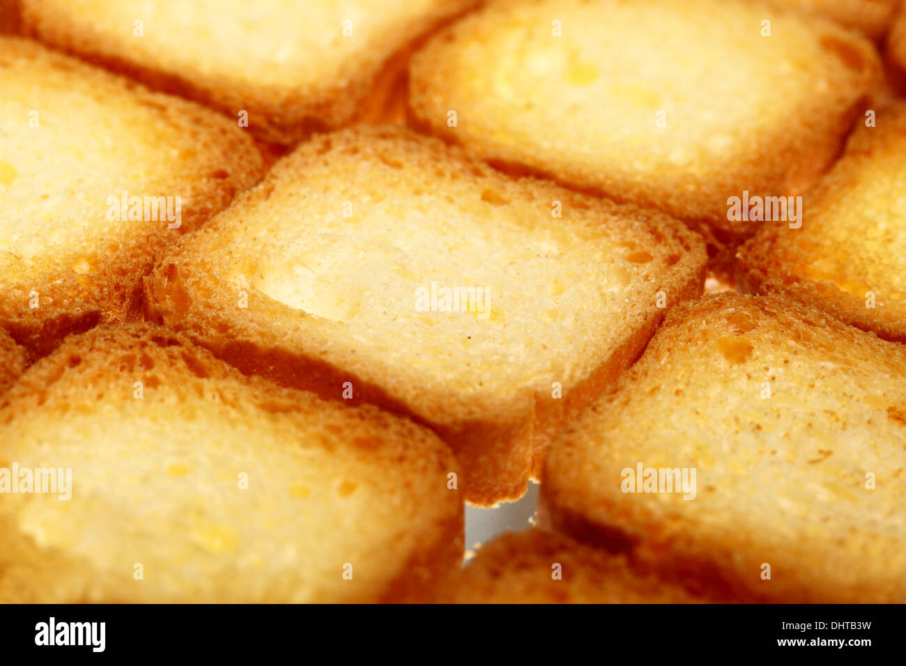 Many small dried rusks bread loaf toast biscuits as texture background ...
