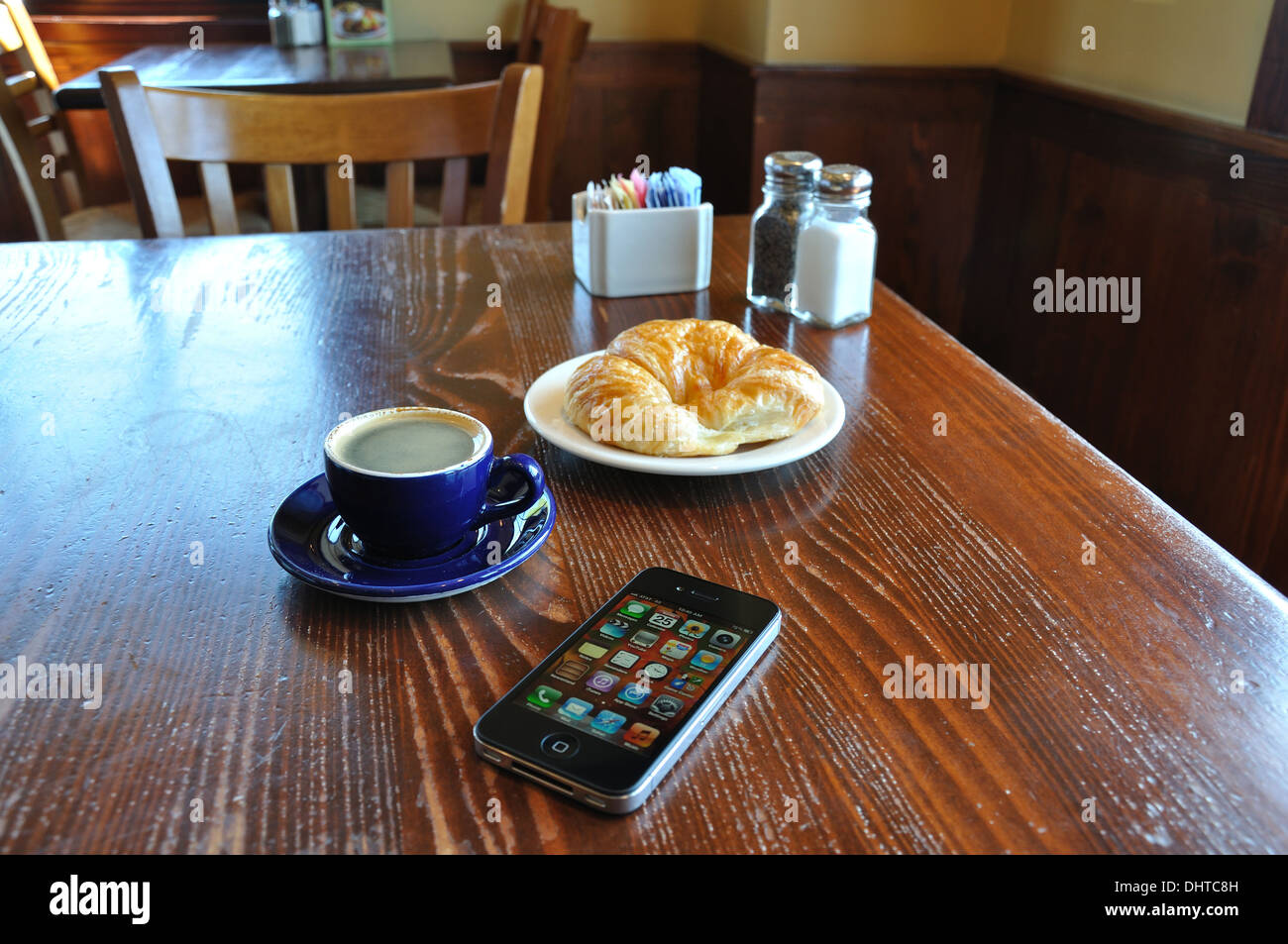 iPhone and breakfast in a cafe Stock Photo - Alamy