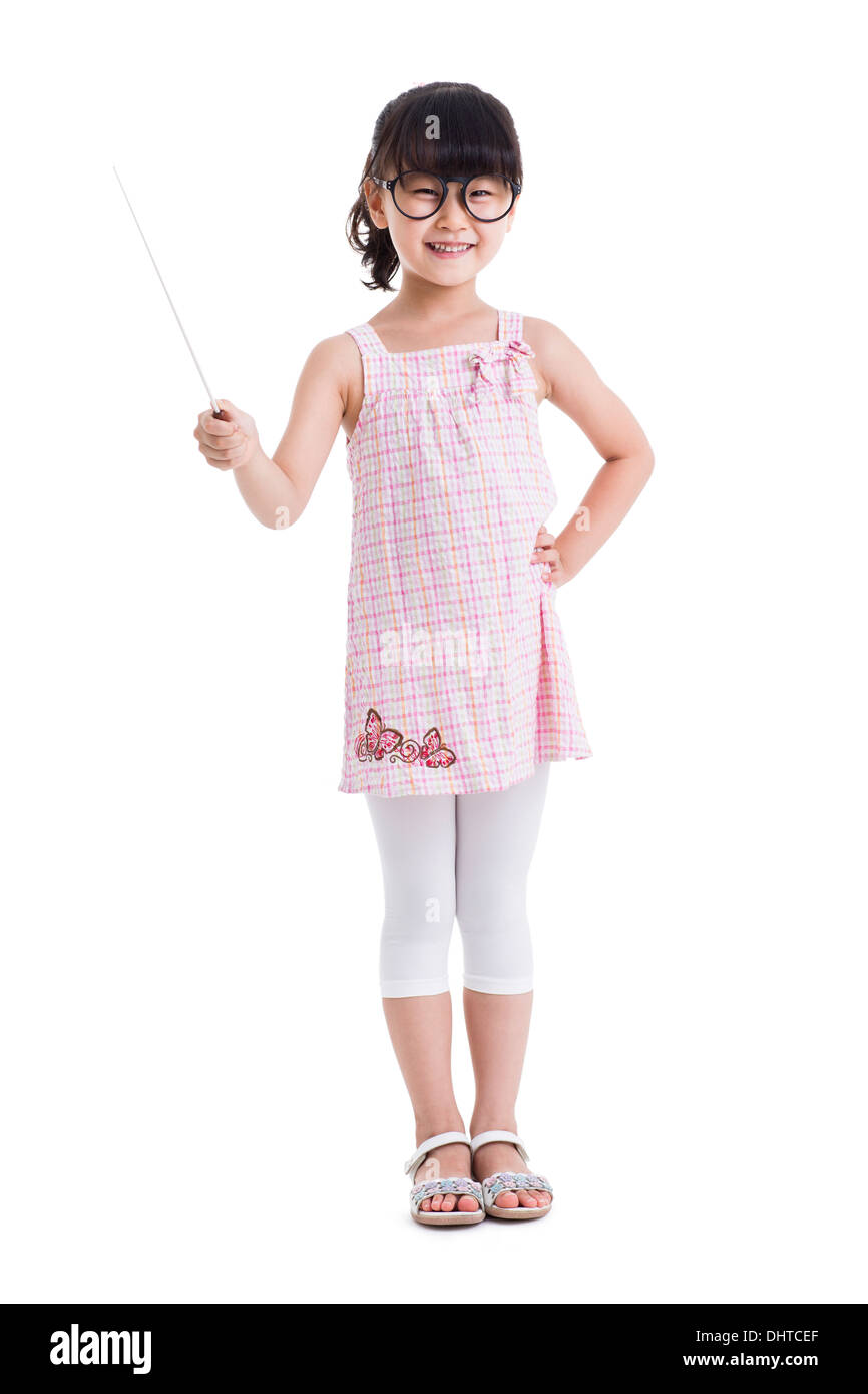 Cute girl playing dressing up Stock Photo - Alamy