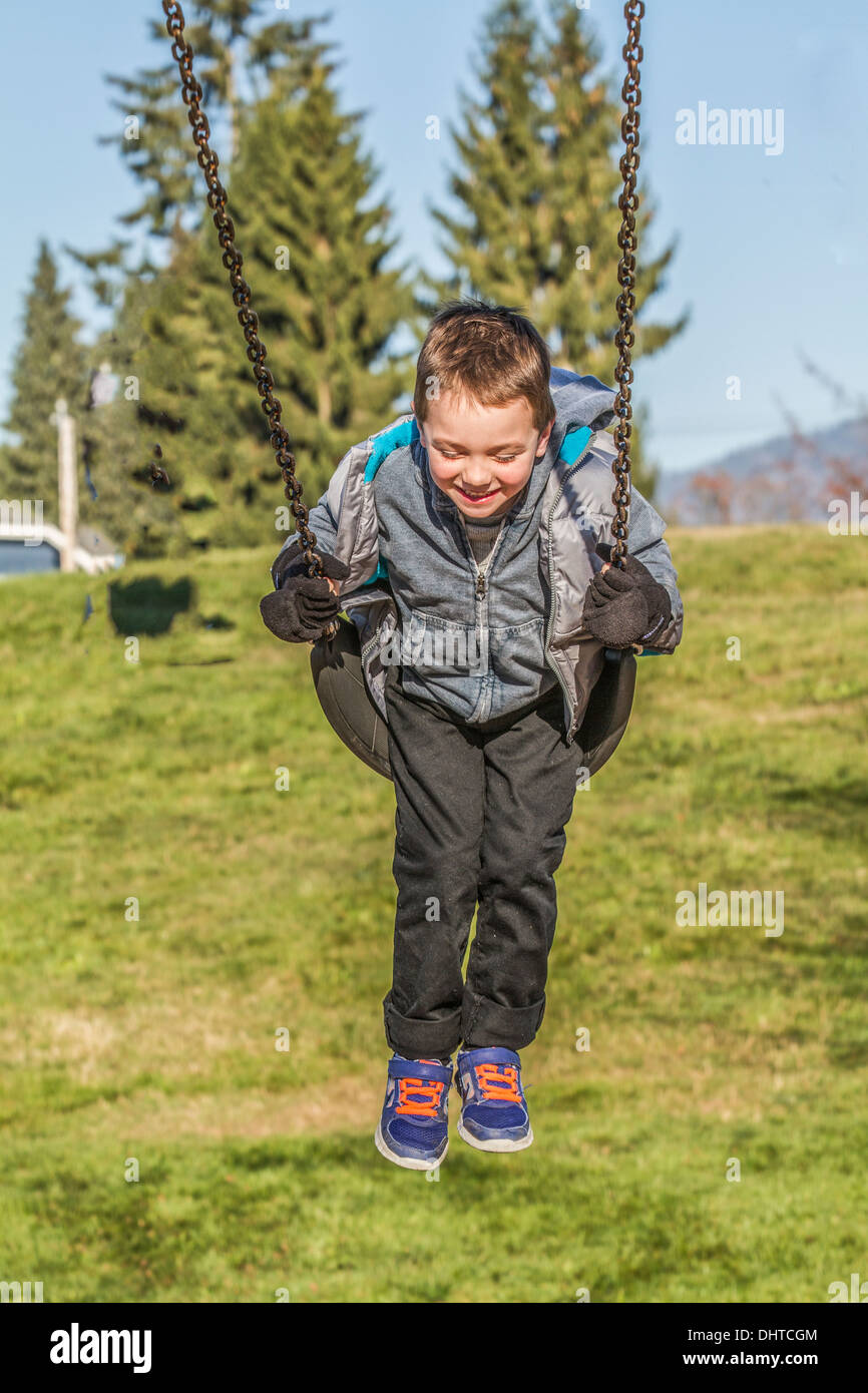 Model released, cute, smiling, laughing, 5 year old boy, having fun in ...