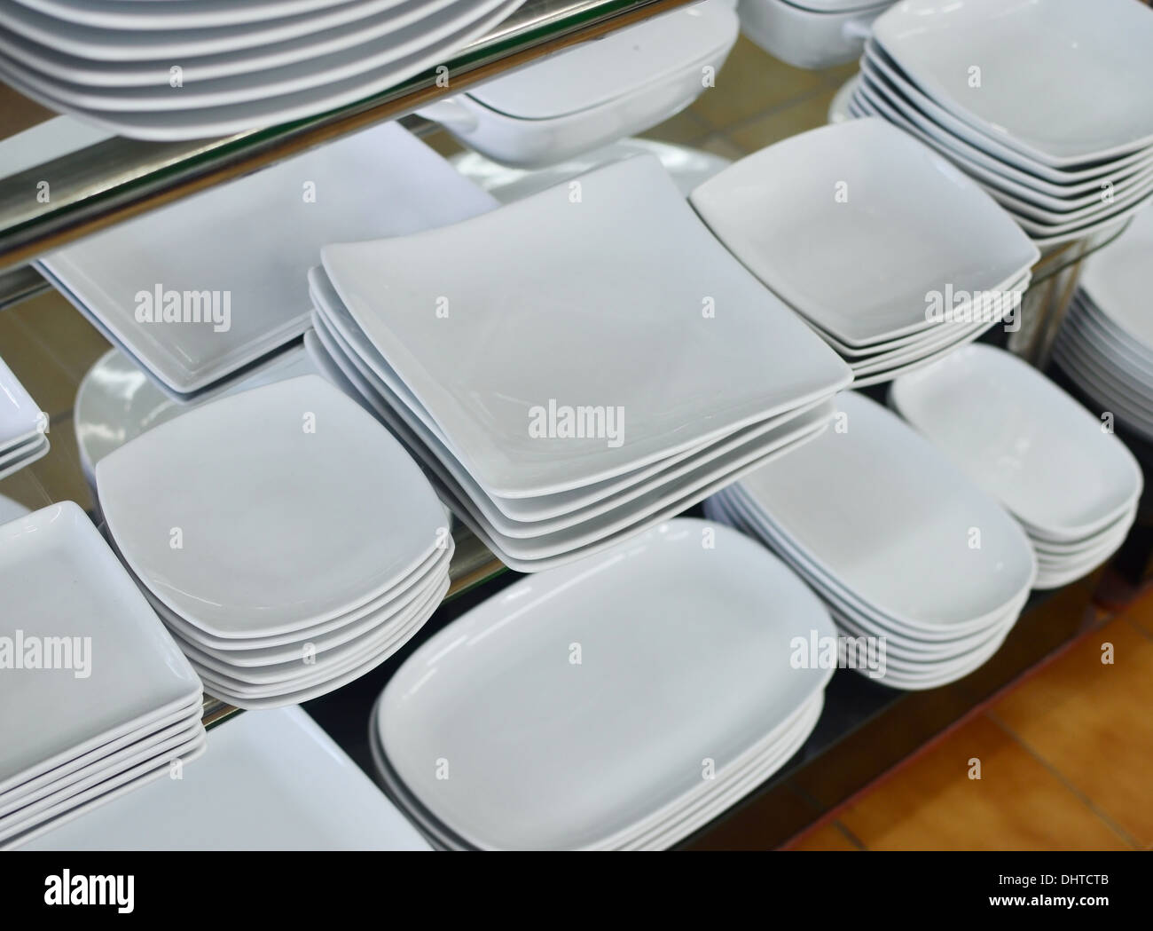 Pile of plates and cutlery hi-res stock photography and images - Alamy