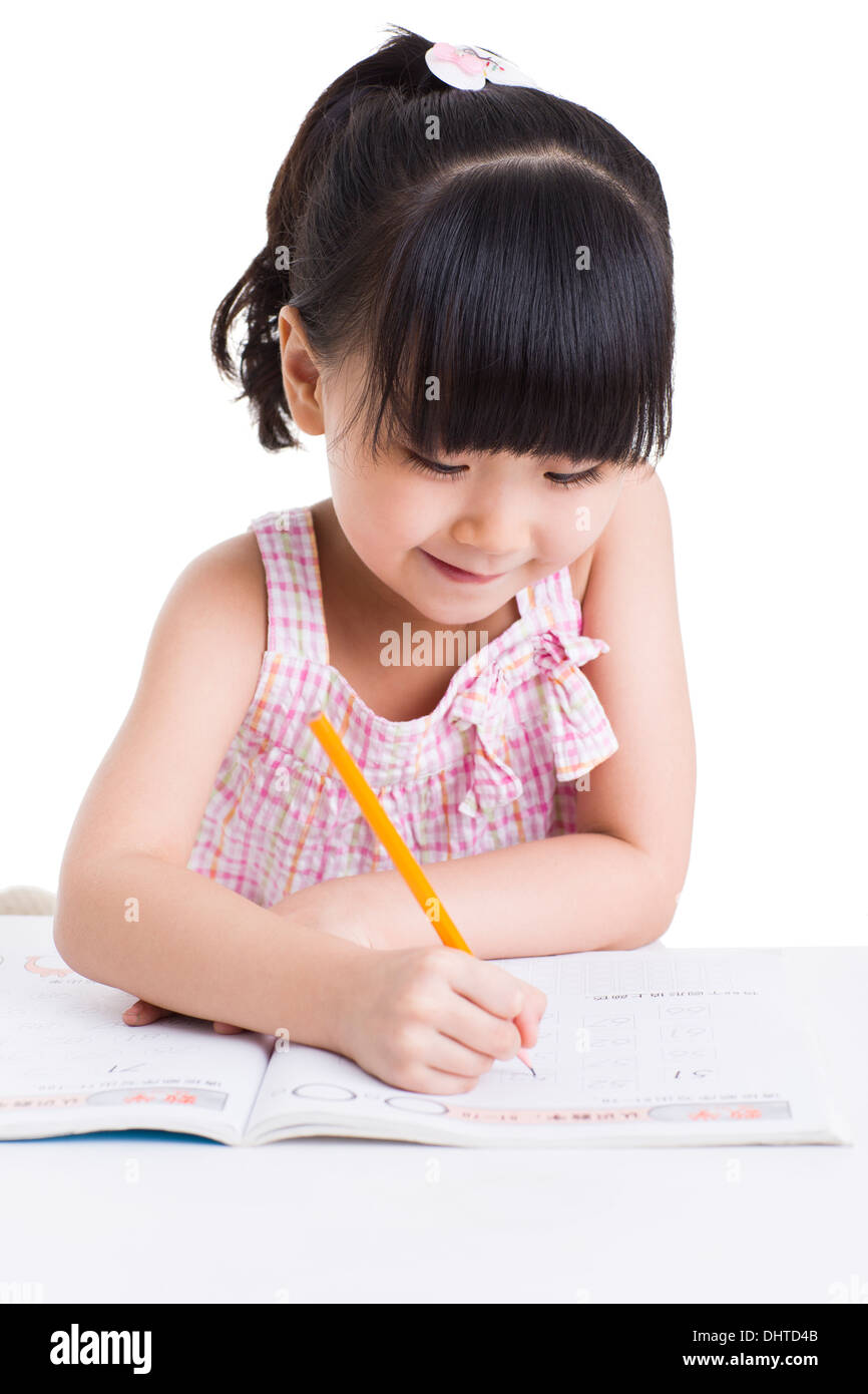 Happy girl doing homework Stock Photo - Alamy