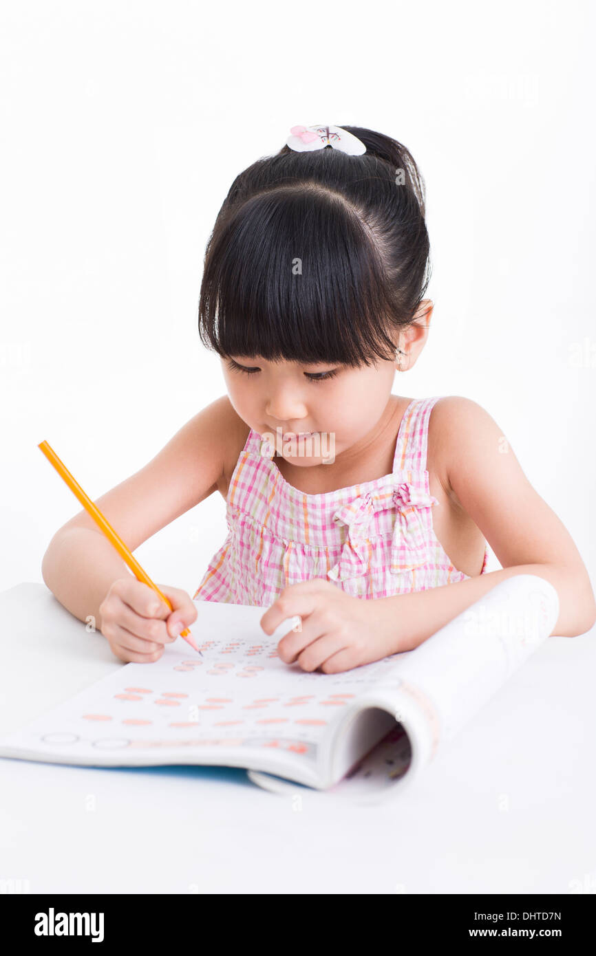 Chinese girl desk school elementary Cut Out Stock Images & Pictures - Alamy