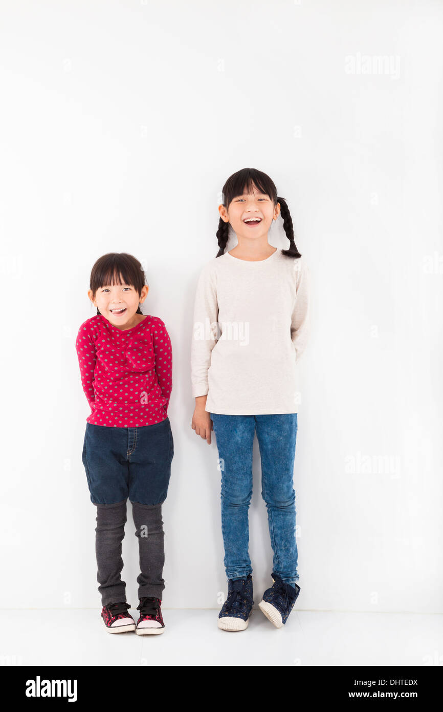 Two girls stand hi-res stock photography and images - Alamy