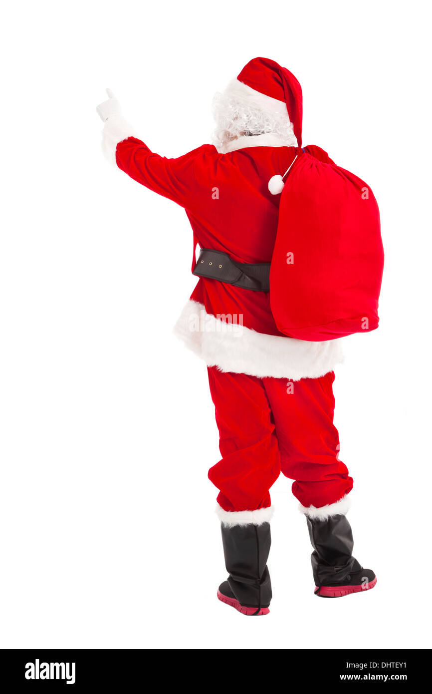 merry Christmas Santa Claus pointing and rear view Stock Photo - Alamy